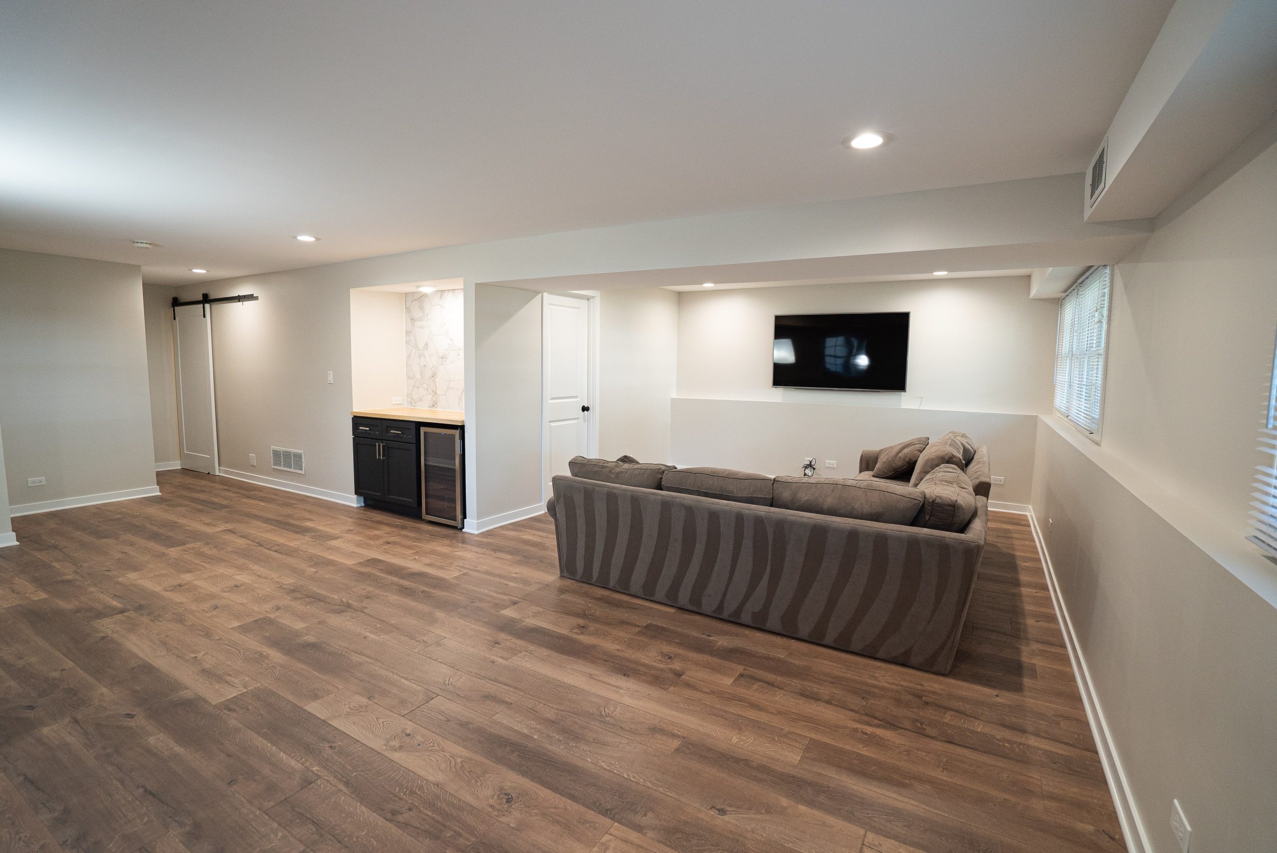 Pros and Cons of Finishing Your Basement vs Building an Addition